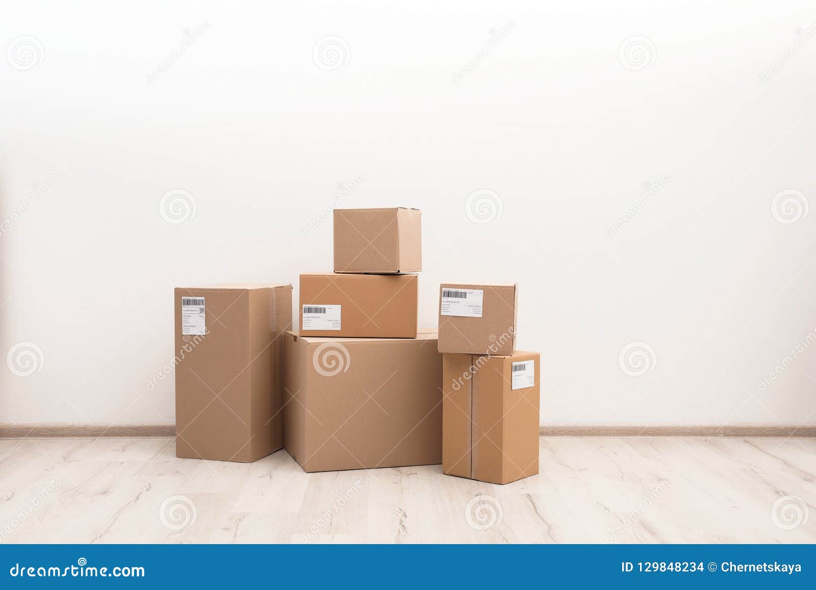 Stacked Parcel Boxes on Floor Stock Photo - Image of cardboard ...