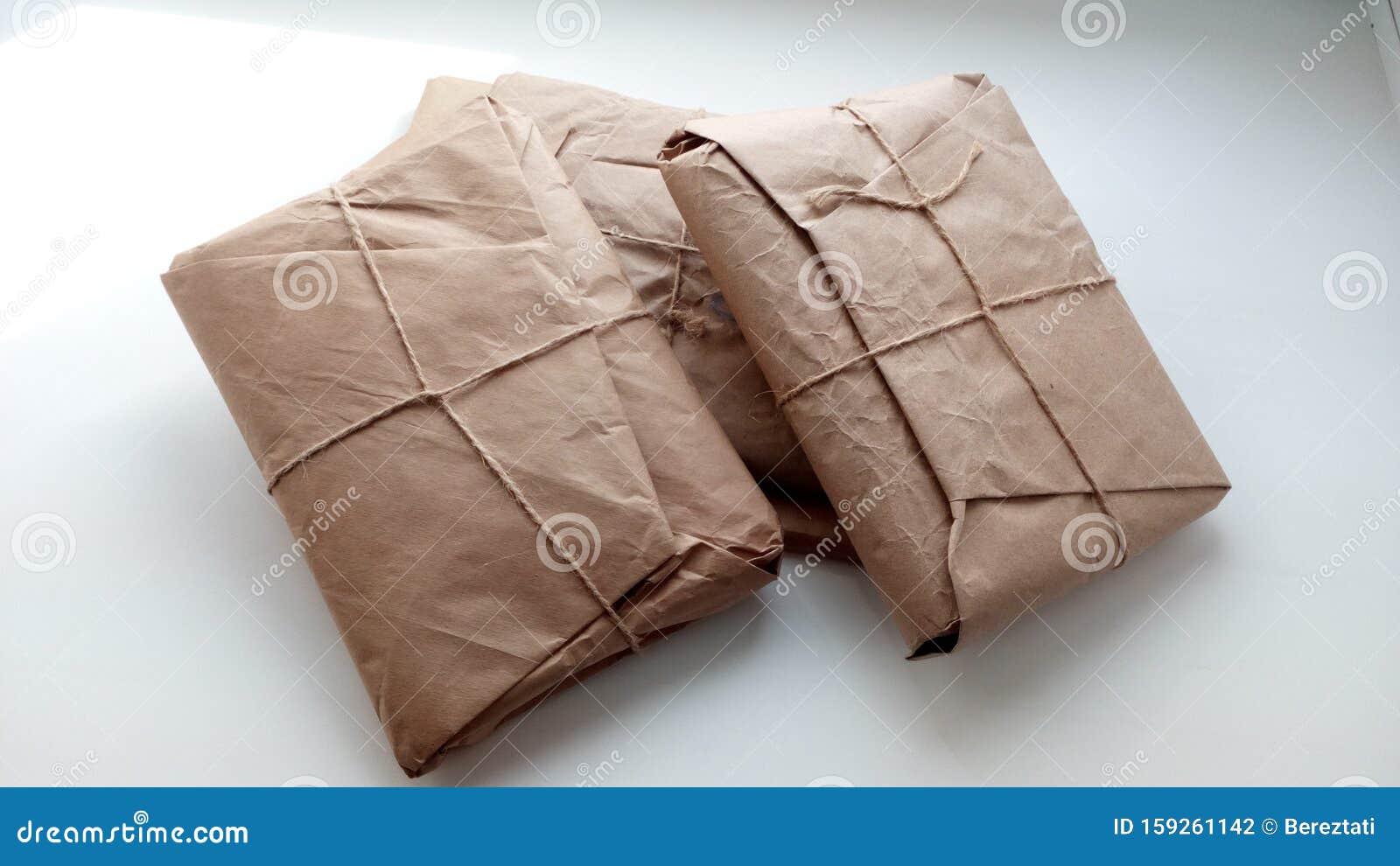 Stacked Parcels Wrapped in Coarse Paper Stock Photo - Image of close ...