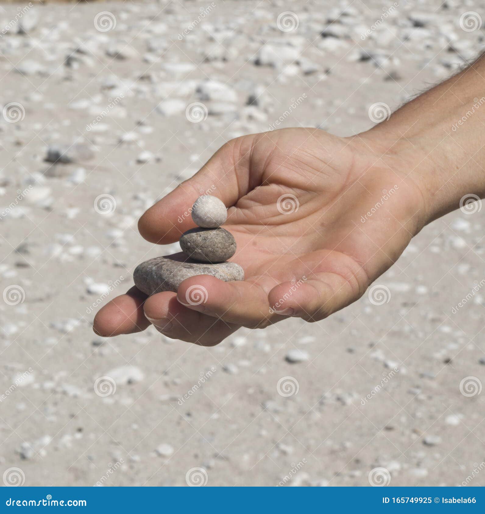 Stacked Pebble Stones in Man`s Hand Stock Image - Image of stack ...
