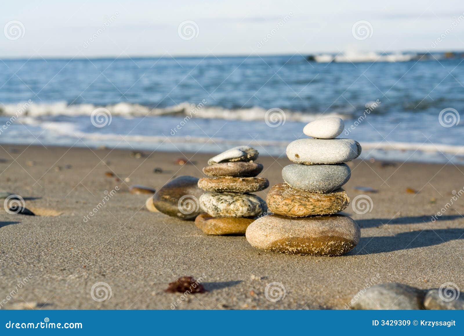 Stacked pebbles on beach stock image. Image of damp, outdoor - 3429309