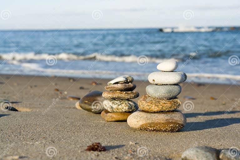 Stacked pebbles on beach stock image. Image of damp, outdoor - 3429309