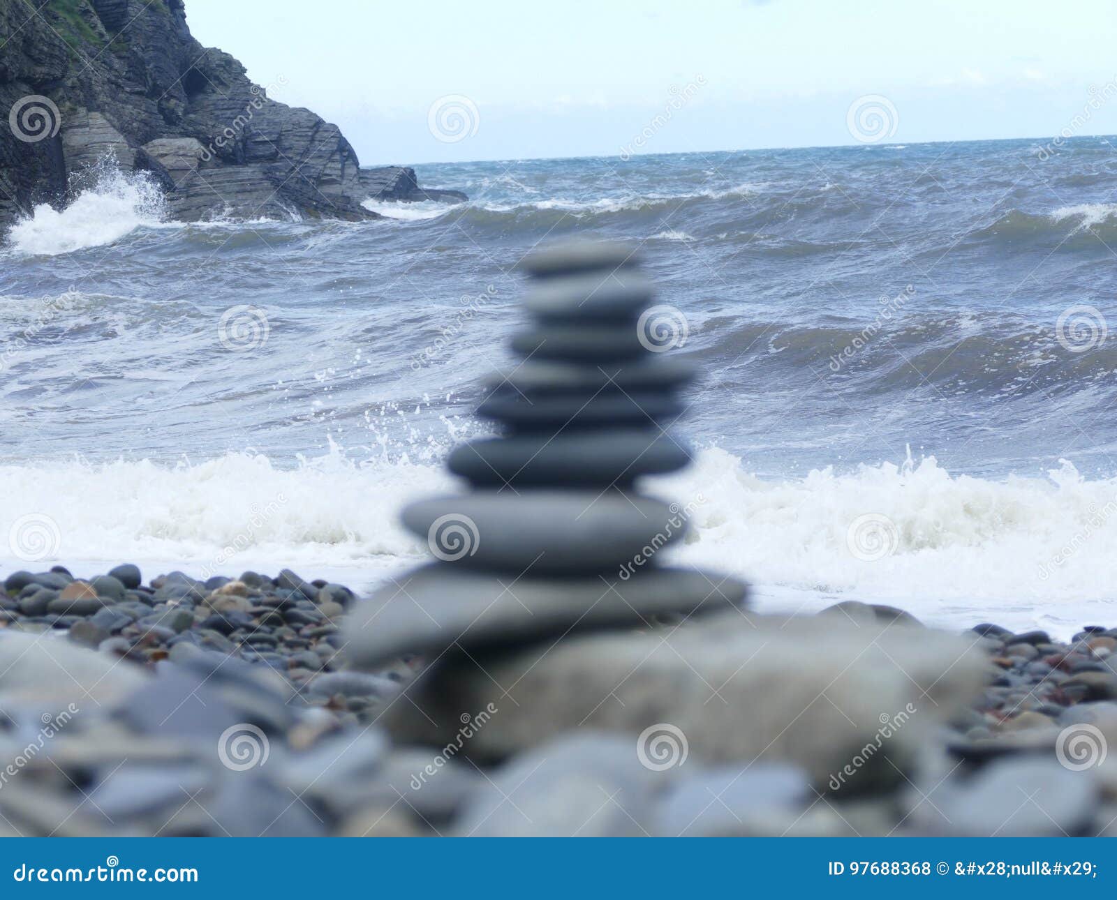 Stacked Tower Pebbles on a Beach Stock Photo - Image of stacked, beach ...