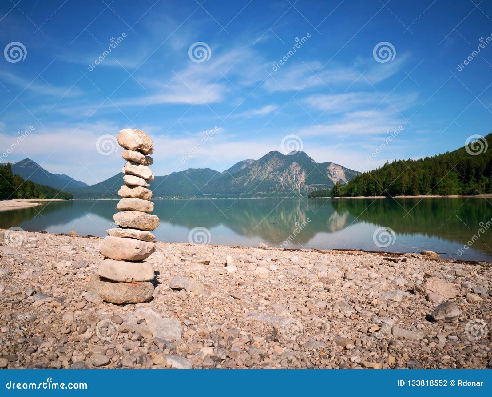 Stacked Pebbles on the Lake Shore. Balanced Stones Stack Stock Photo ...