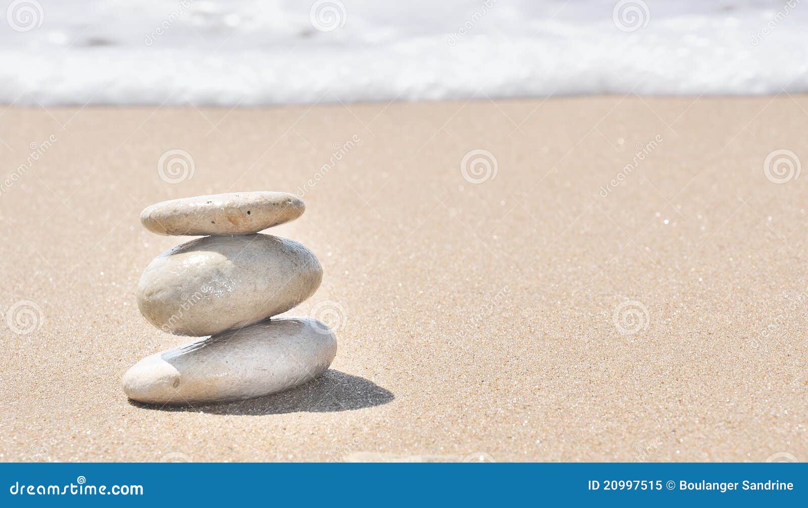 Stacked Pebbles in the Sand Stock Image - Image of texture, white: 20997515