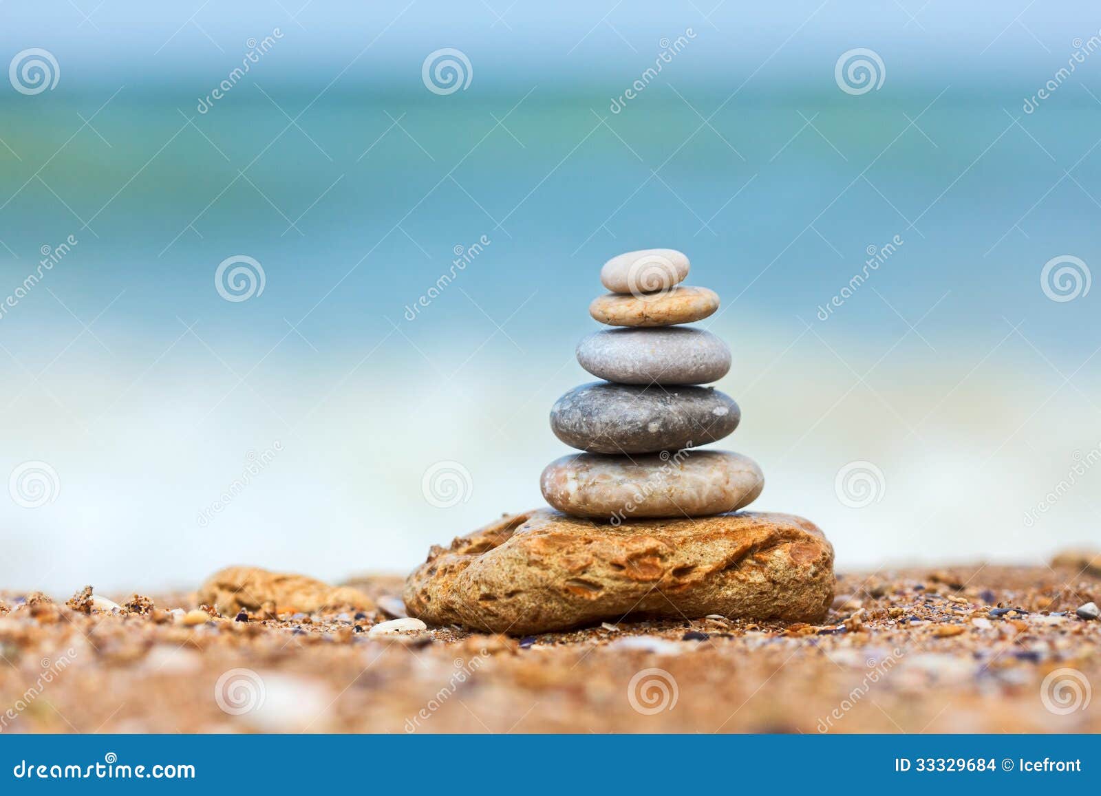 Stacked Pebbles on the Sea Side Stock Photo - Image of nature, pebble ...