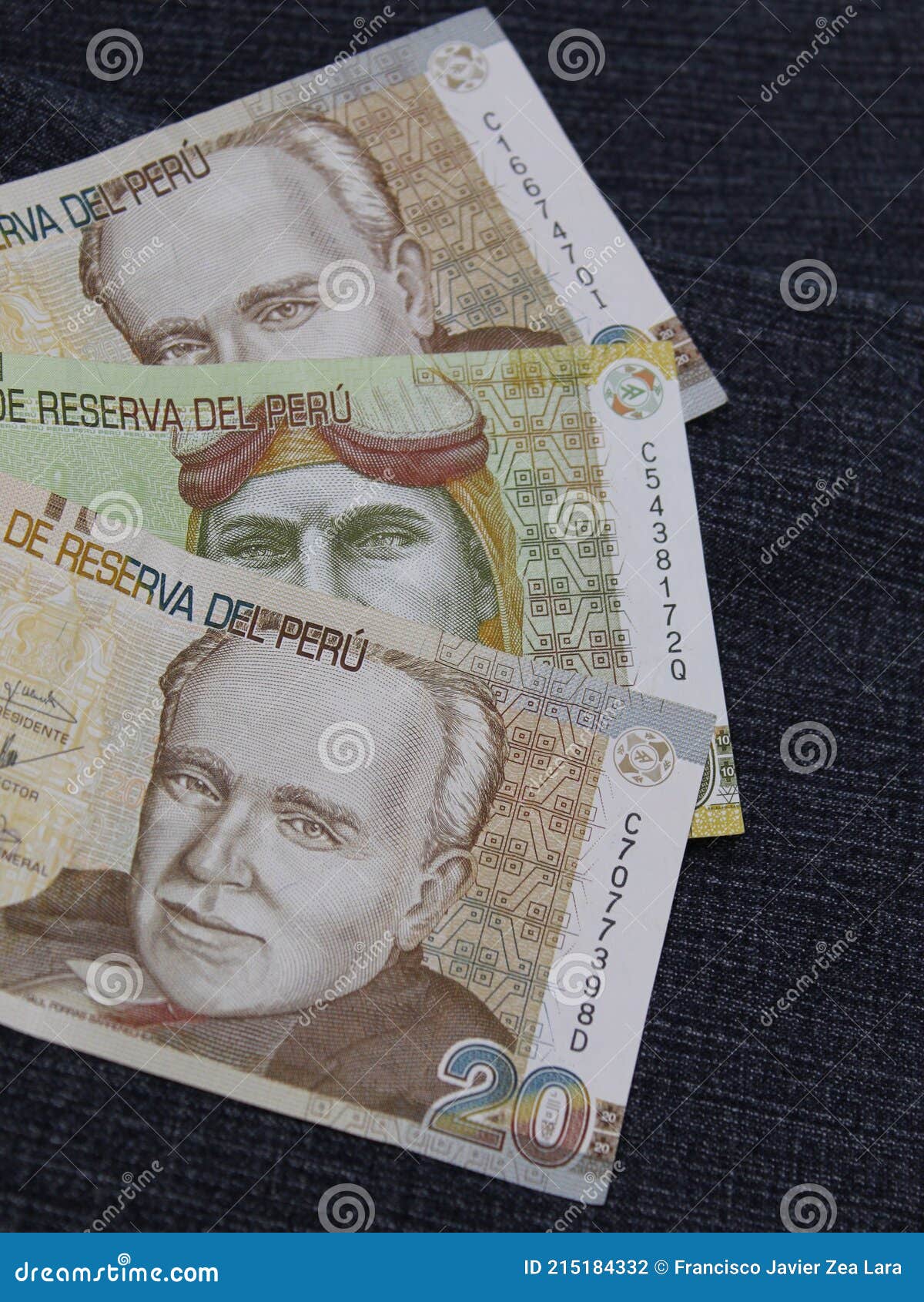 Stacked Peruvian Banknotes between Blue Denim Fabric Stock Photo ...