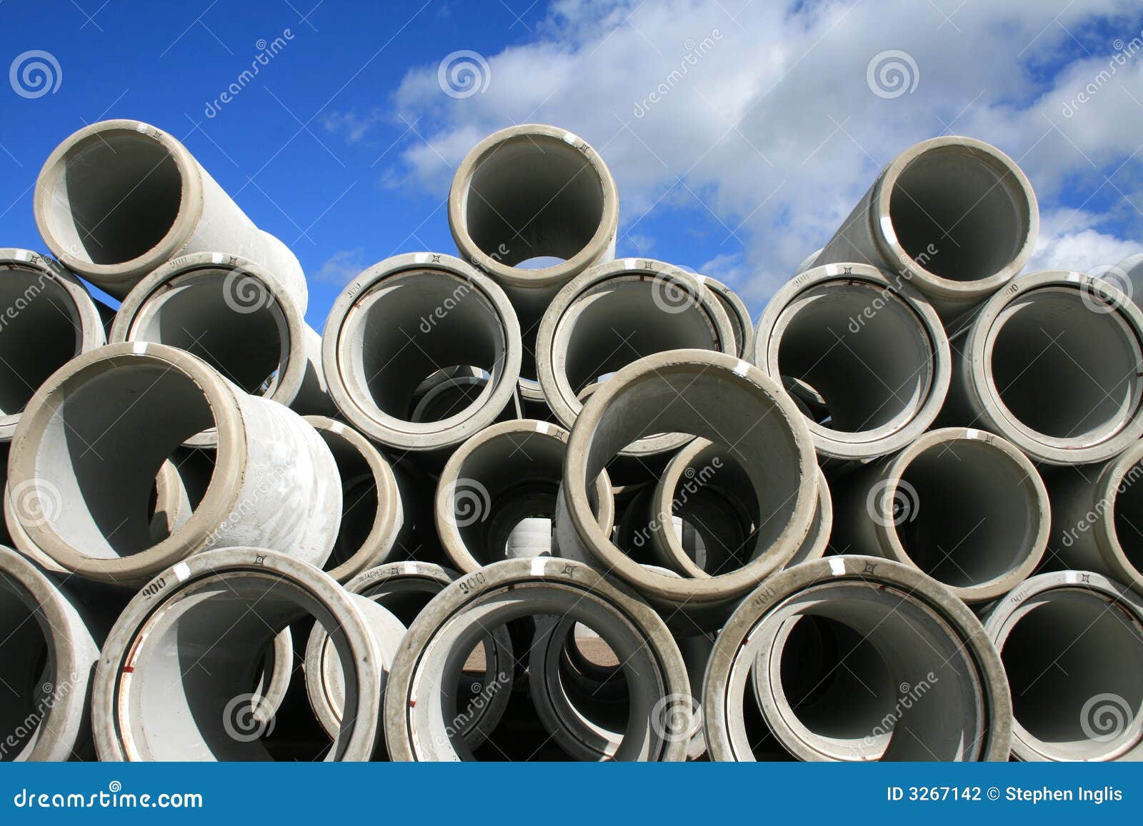 Stacked pipes and sky stock photo. Image of piled, industry - 3267142