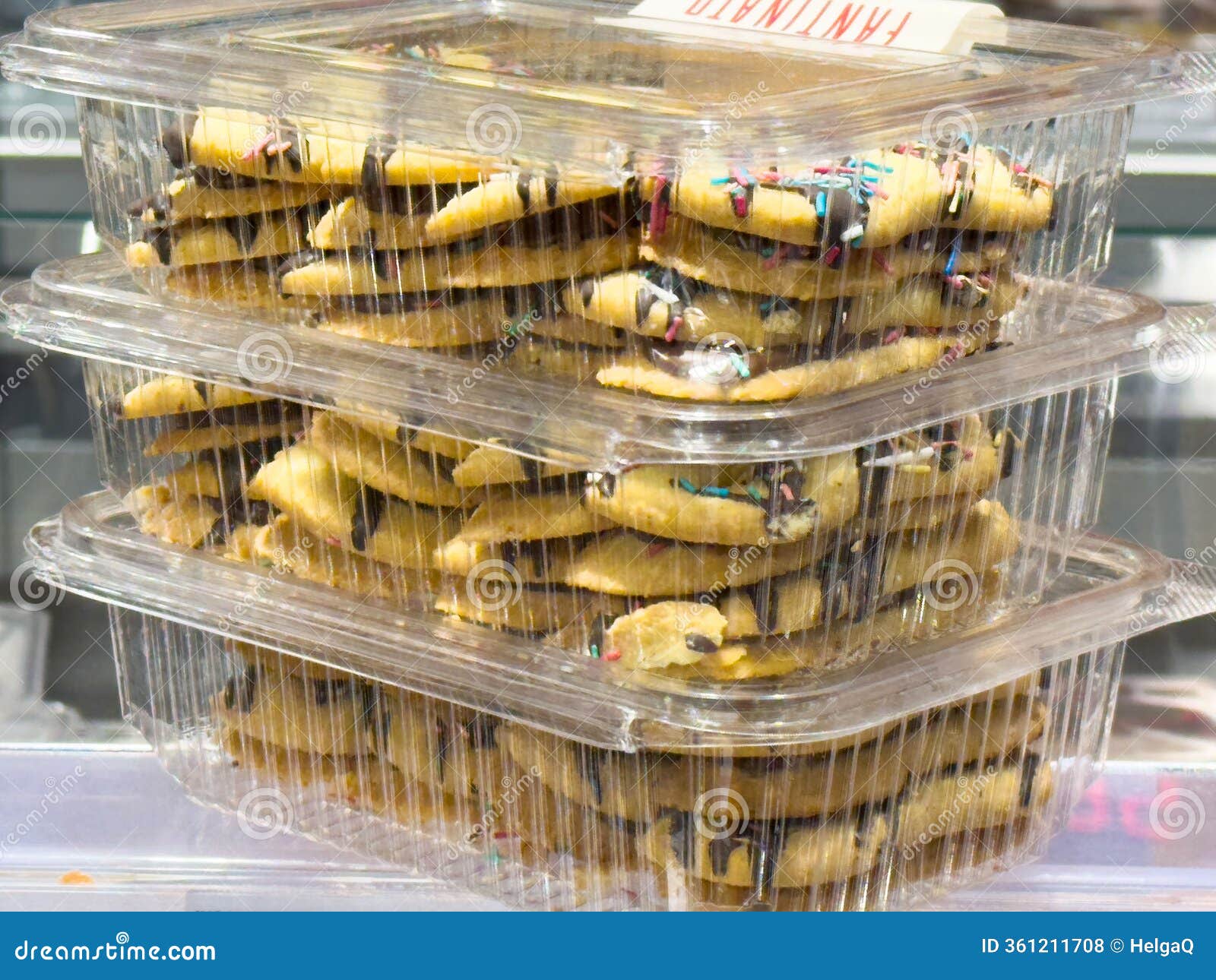 Stacked Plastic Containers of Sprinkle-topped Cookies in a Bakery Display Editorial Stock Photo ...