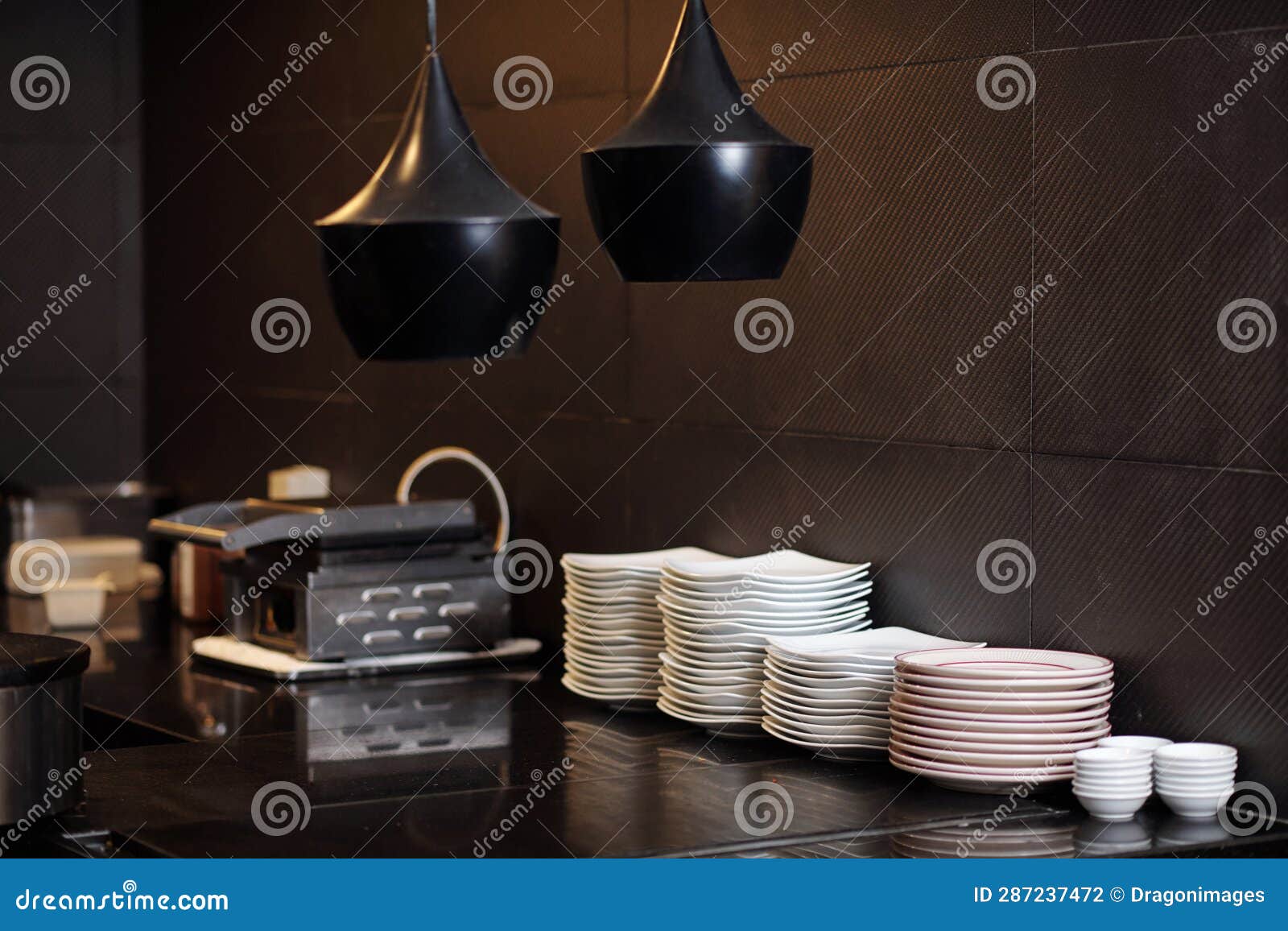 Stacked Plates on Counter stock photo. Image of dinner - 287237472