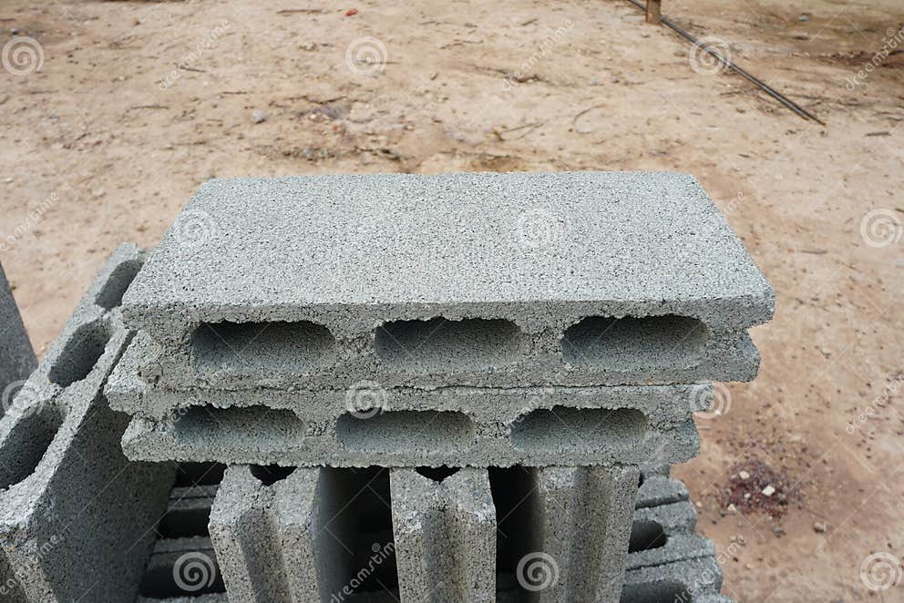Stacked Rectangular Concrete Blocks on the Construction Site. Building ...