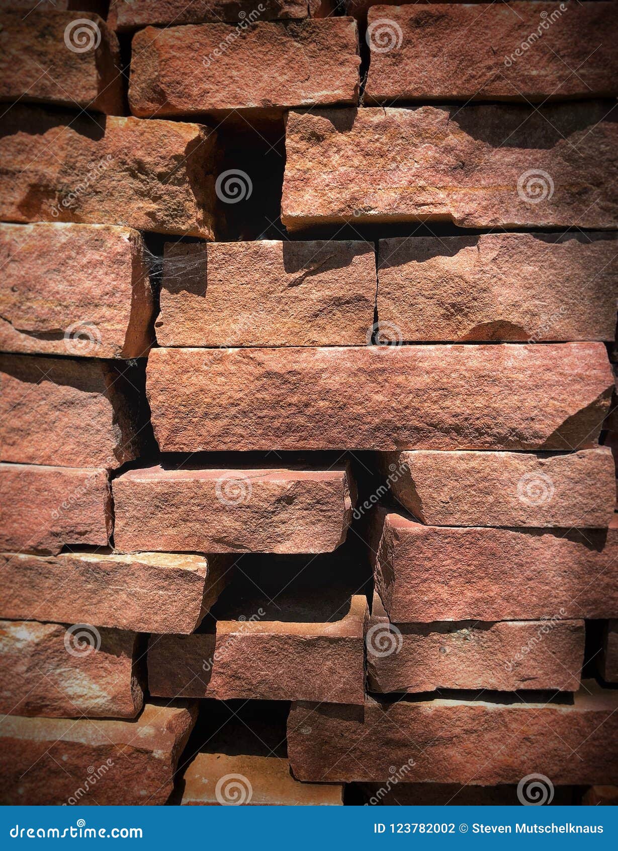 Stacked Red Sandstone wall stock photo. Image of light - 123782002