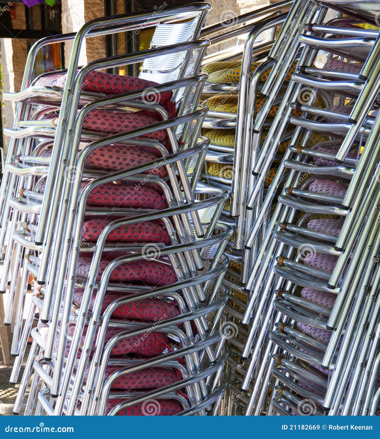 Stacked restaurant chairs stock image. Image of pile - 21182669