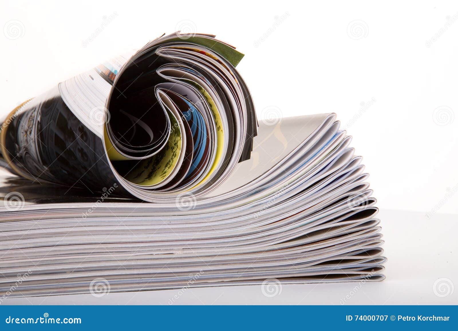 Stacked and Rolled Magazines Stock Image - Image of edges, color: 74000707
