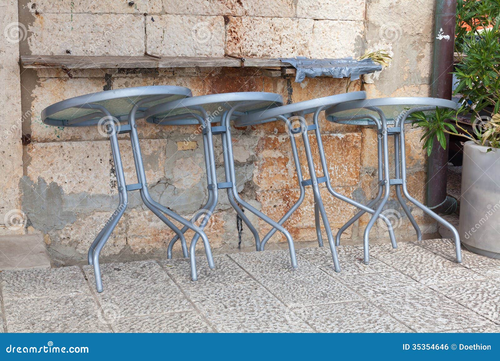 Stacked Set of Circular Cafe Tables Stock Photo - Image of urban, rough ...