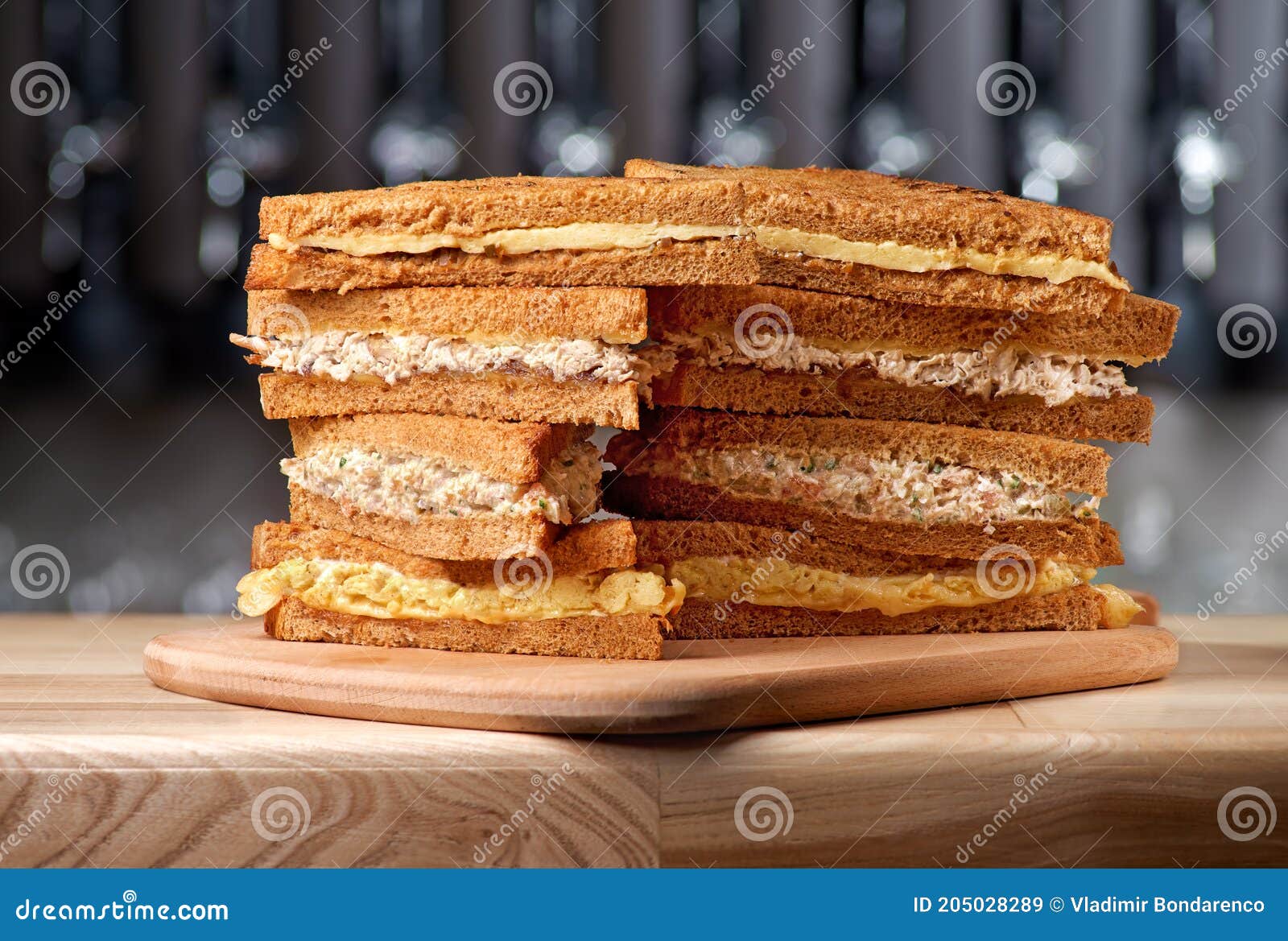 Stacked Stack of Sandwiches on a Chalkboard with Various Ingredients ...