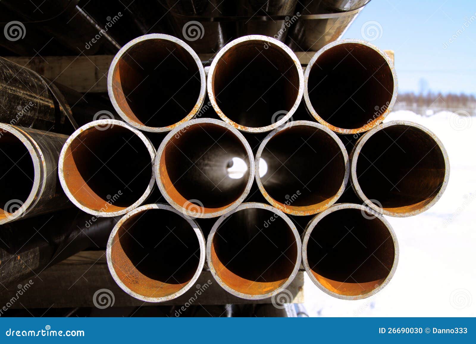 Stacked steel pipes stock photo. Image of iron, industrial - 26690030