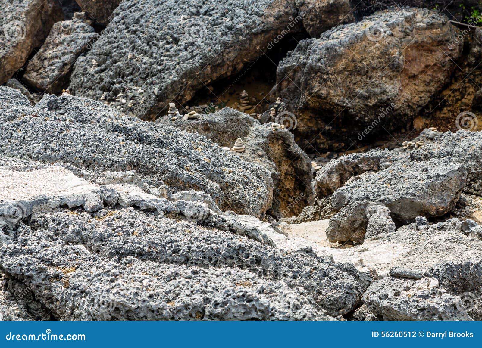 Stacked Stones on Black Coral Stock Photo - Image of coast, stone: 56260512