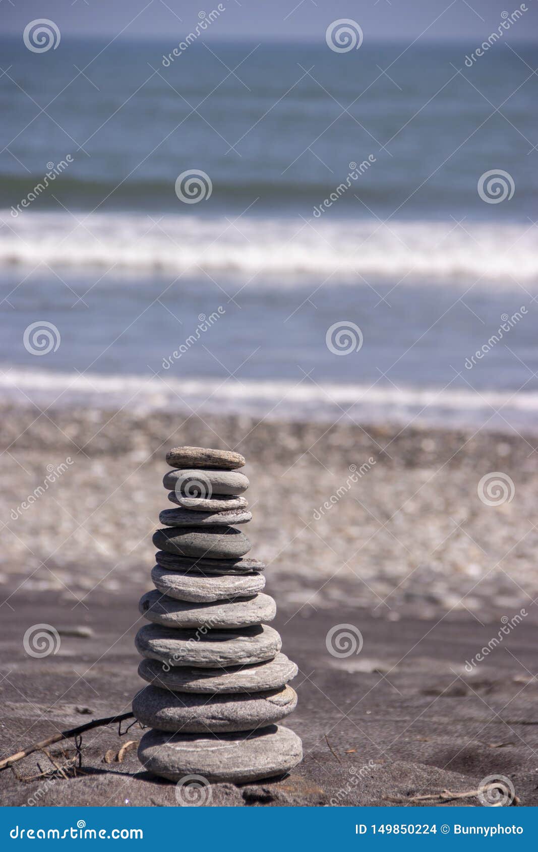 Stacked Stones on the Beach Stock Photo - Image of rock, stone: 149850224