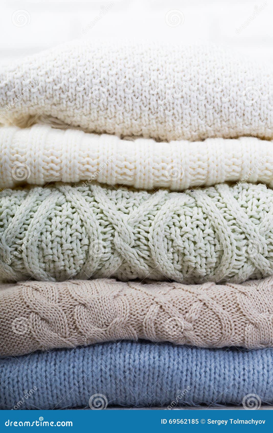 Stacked sweaters stock image. Image of wooden, white - 69562185