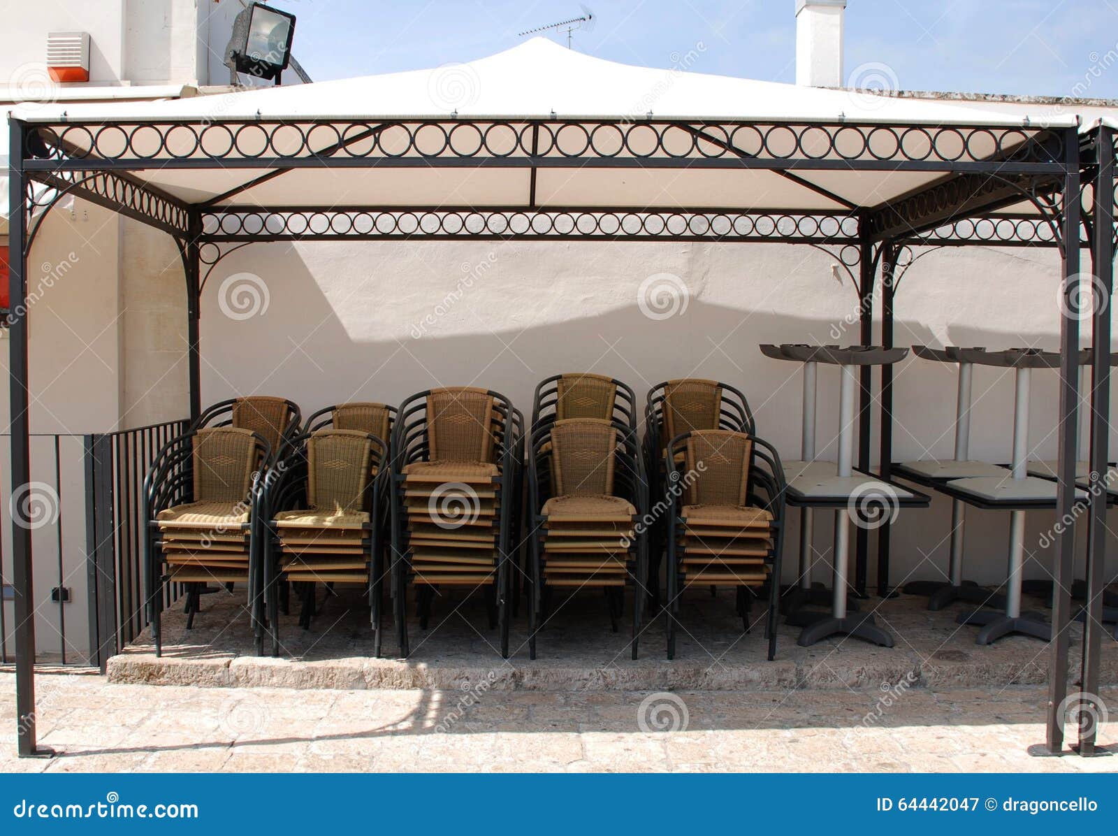 Stacked Tables and Chairs stock image. Image of seats - 64442047