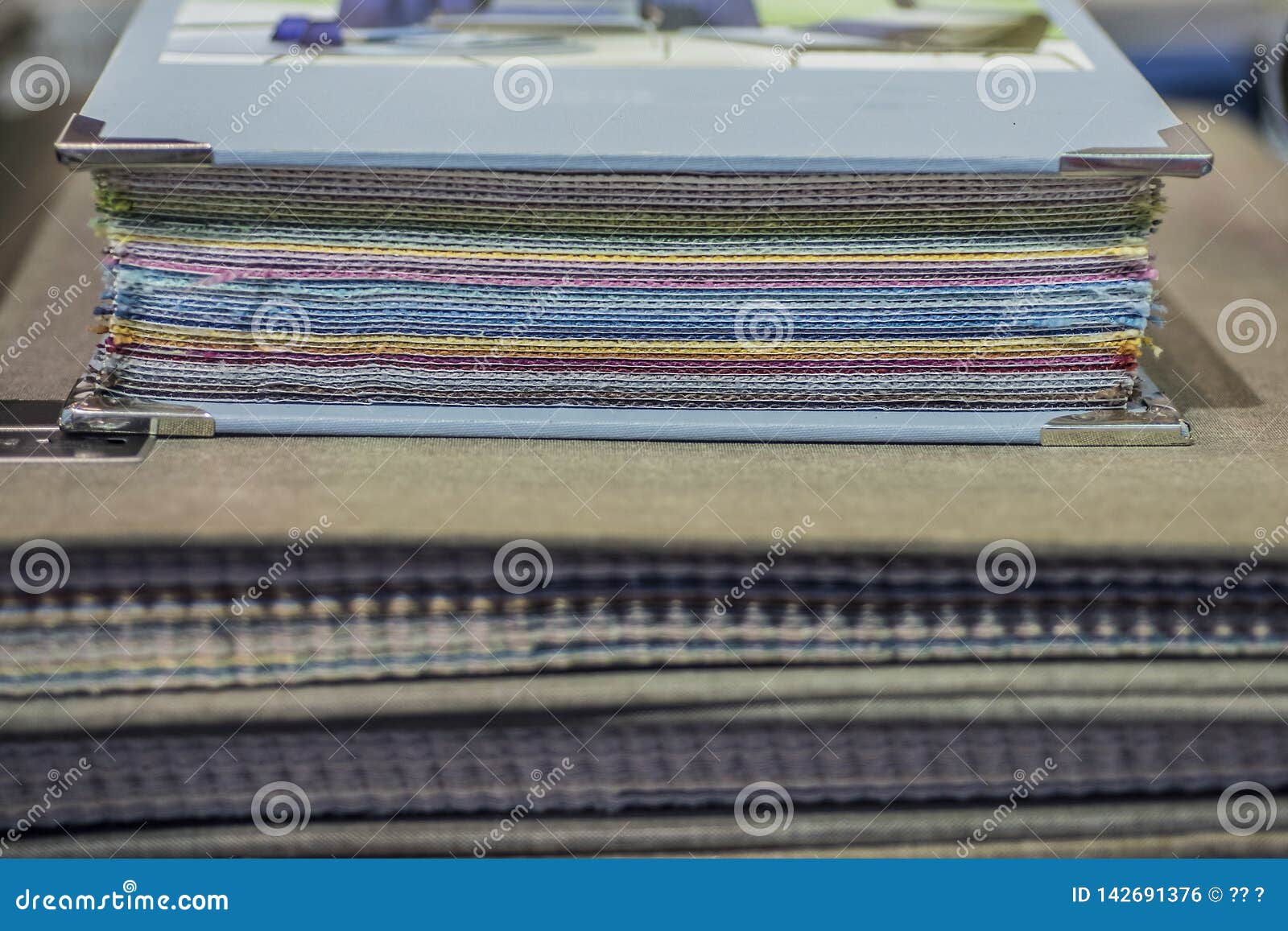 A Folder with Decorative Wall Covering Samples Stock Photo - Image of ...