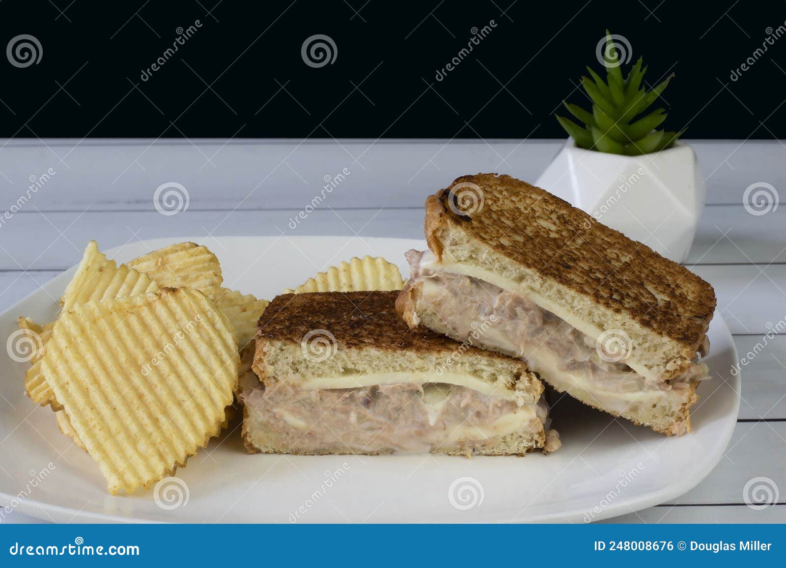 Stacked Tuna Melt with a Side of Potato Chips Stock Photo - Image of ...
