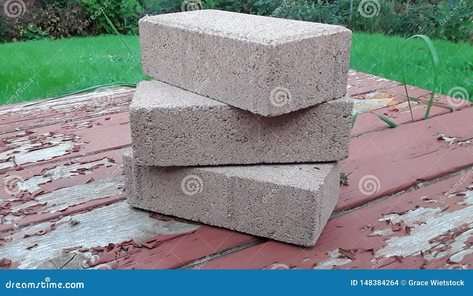 Stacked Up Bricks stock photo. Image of stacked, green - 148384264