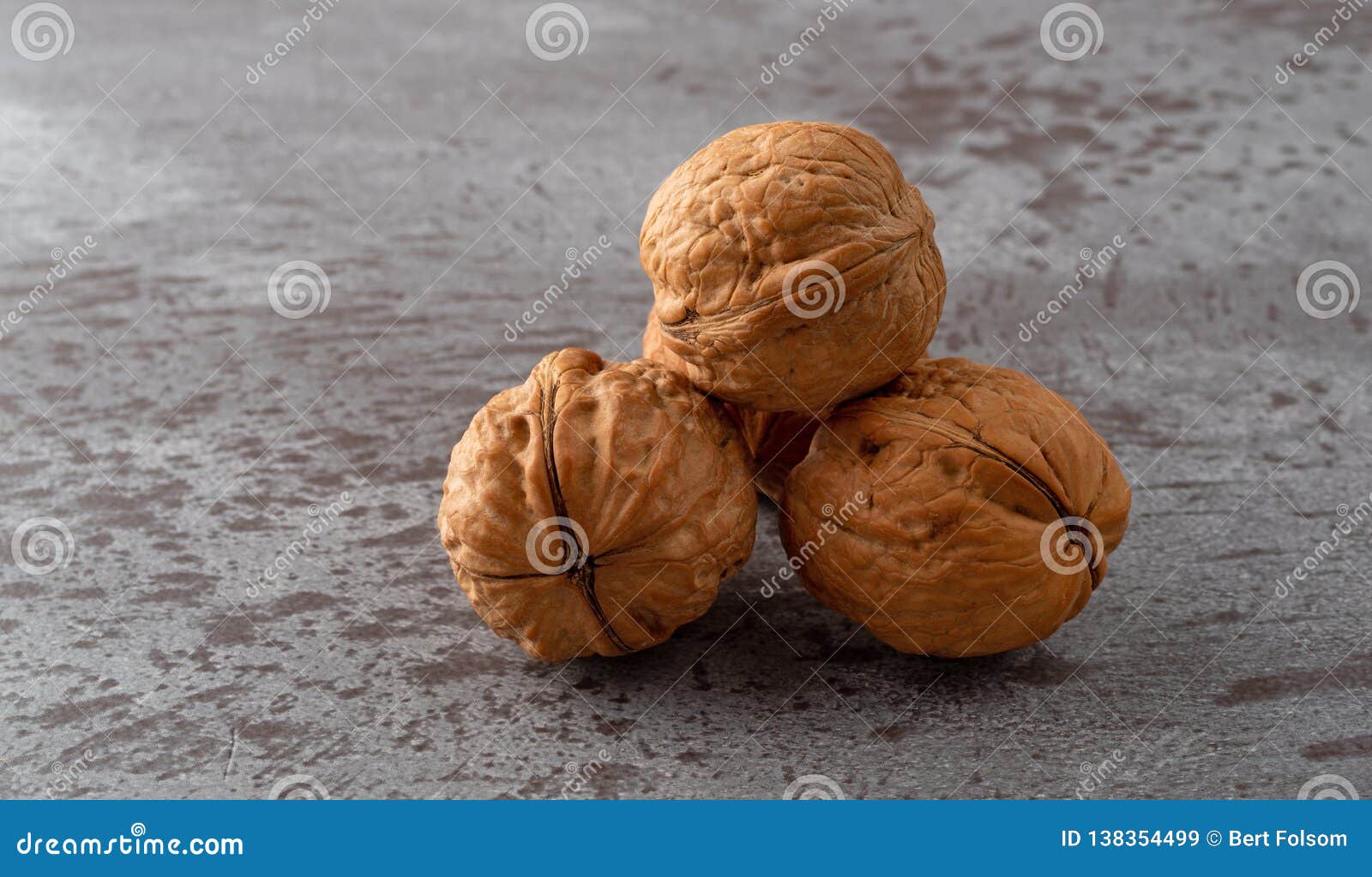 Stacked Walnuts on a Gray Background Stock Image - Image of nutshell ...