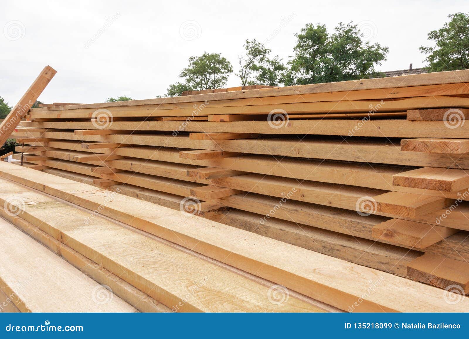 Stacked Wood Pine Timber for Home Base Construction Stock Image - Image ...