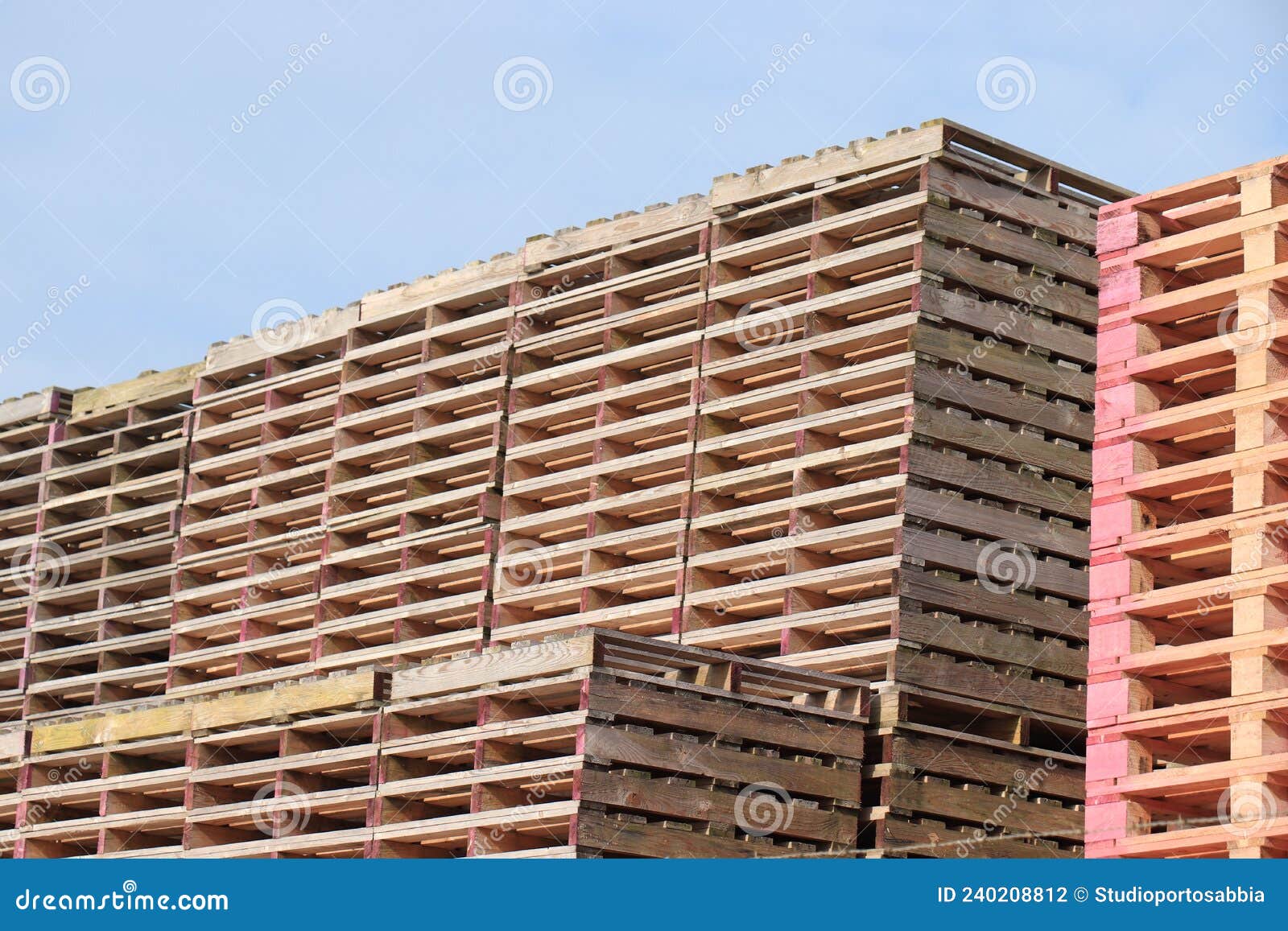 Stacked wooden pallets stock photo. Image of recycling - 240208812