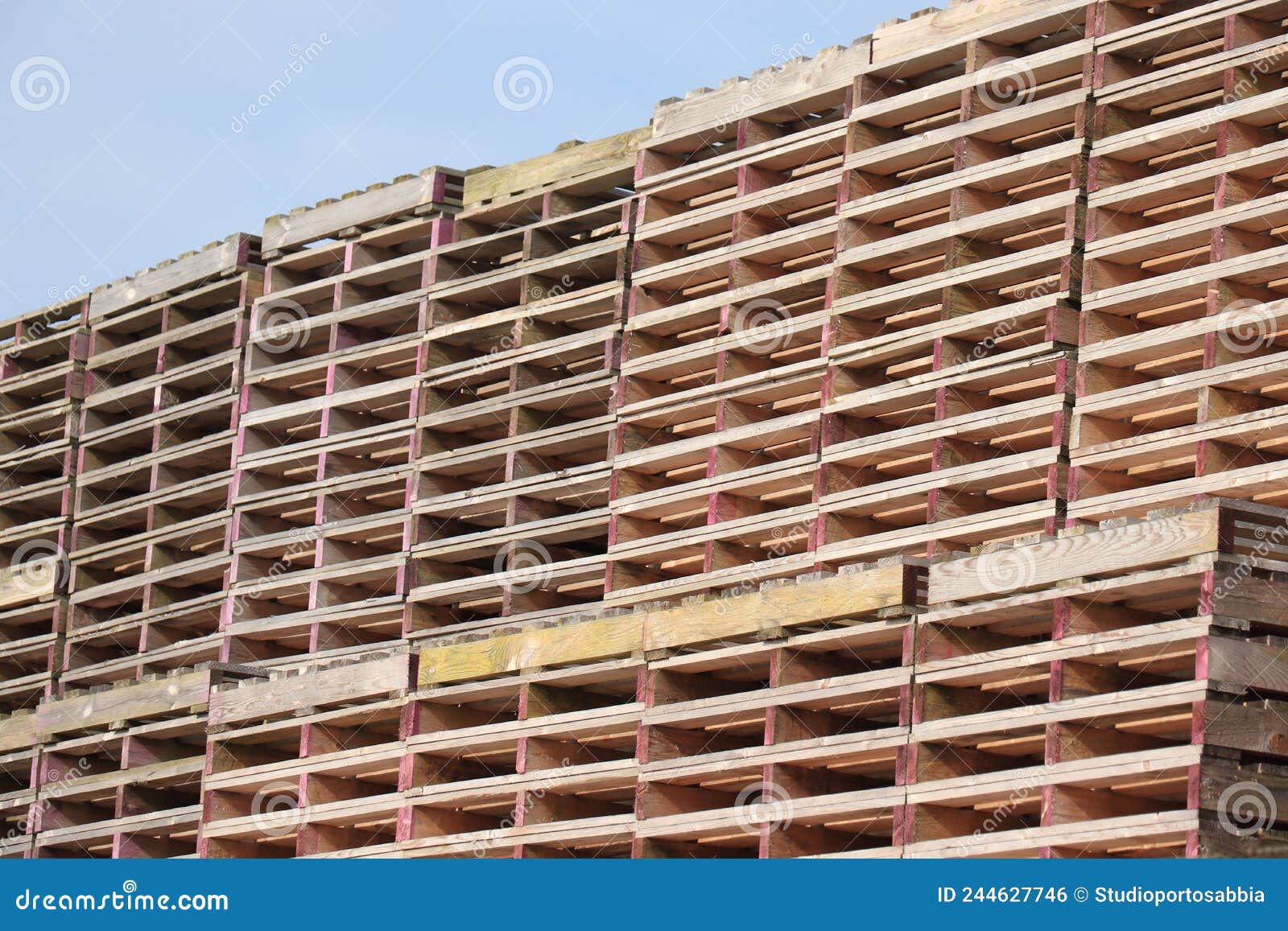 Stacked wooden pallets stock photo. Image of logistic - 244627746