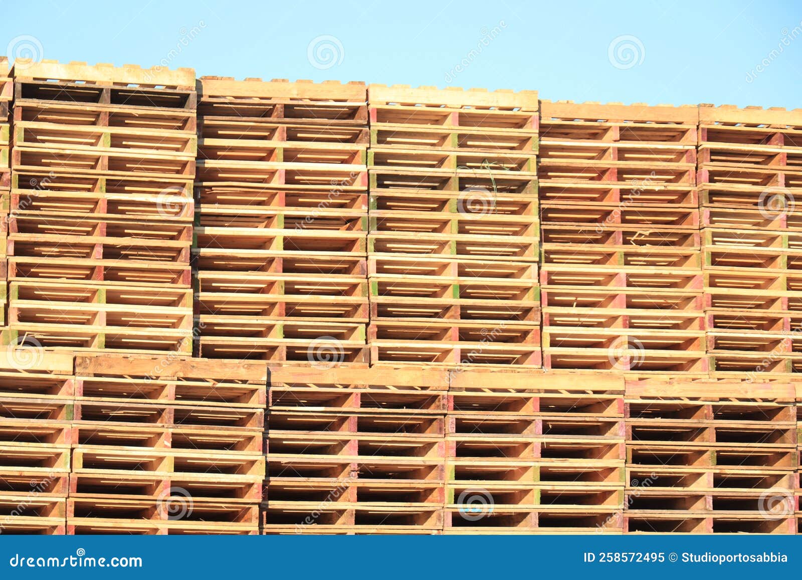 Stacked wooden pallets stock image. Image of sustainable - 258572495