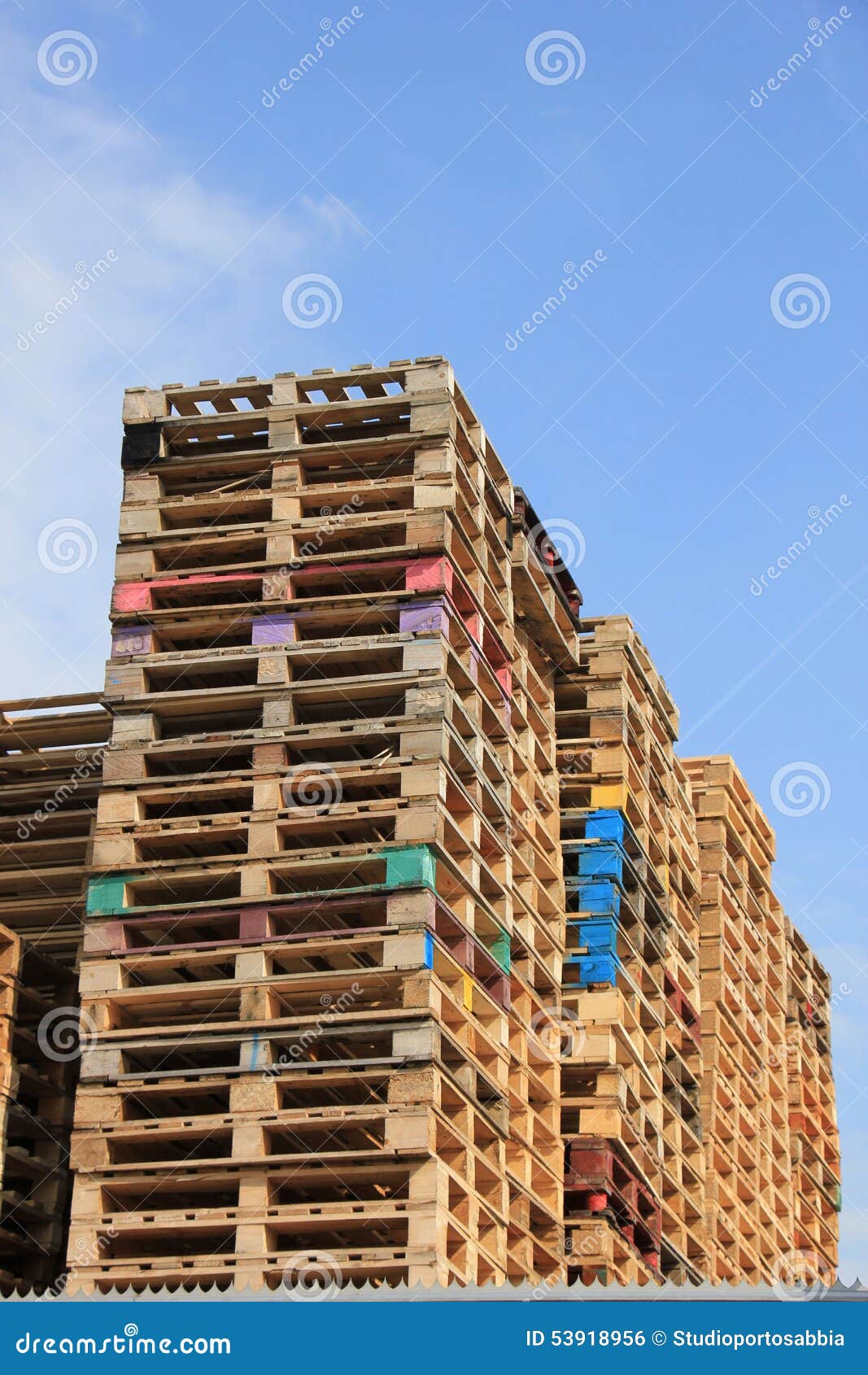 Stacked wooden pallets stock photo. Image of logistic - 53918956