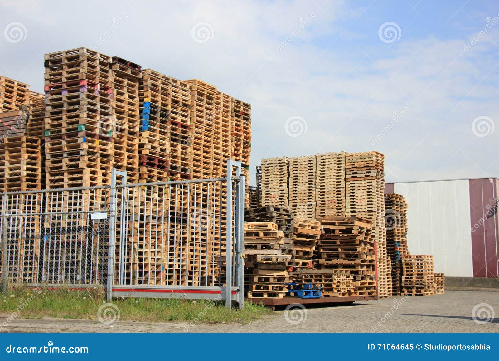 Stacked wooden pallets stock image. Image of logistic - 71064645