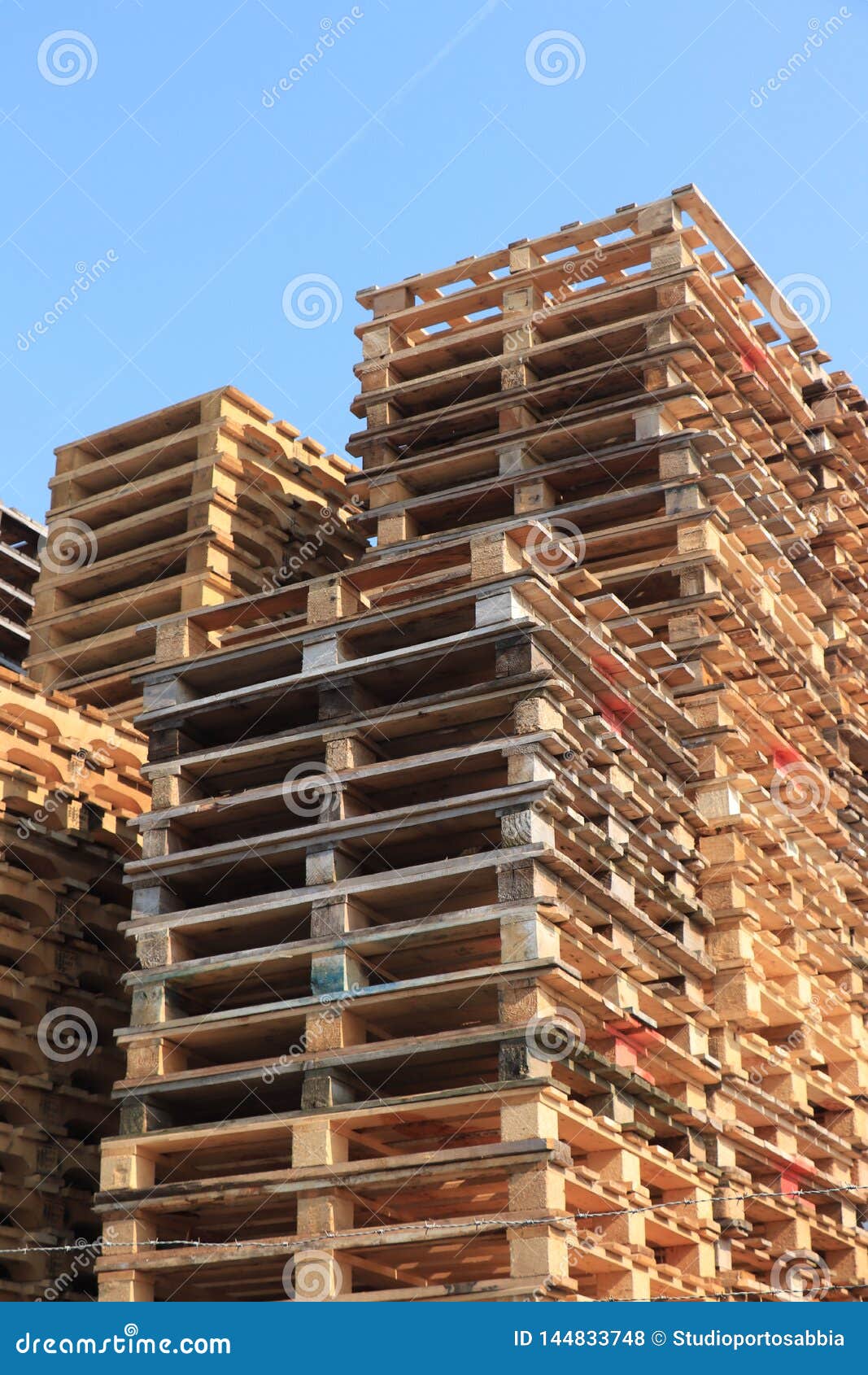 Stacked wooden pallets stock photo. Image of wood, transport - 144833748
