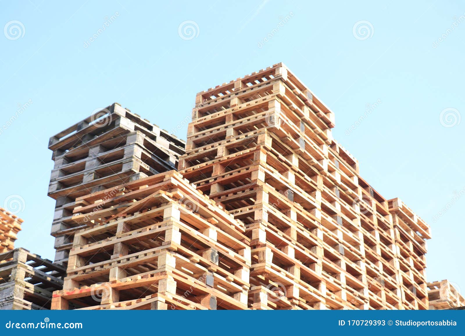 Stacked wooden pallets stock image. Image of pile, business - 170729393