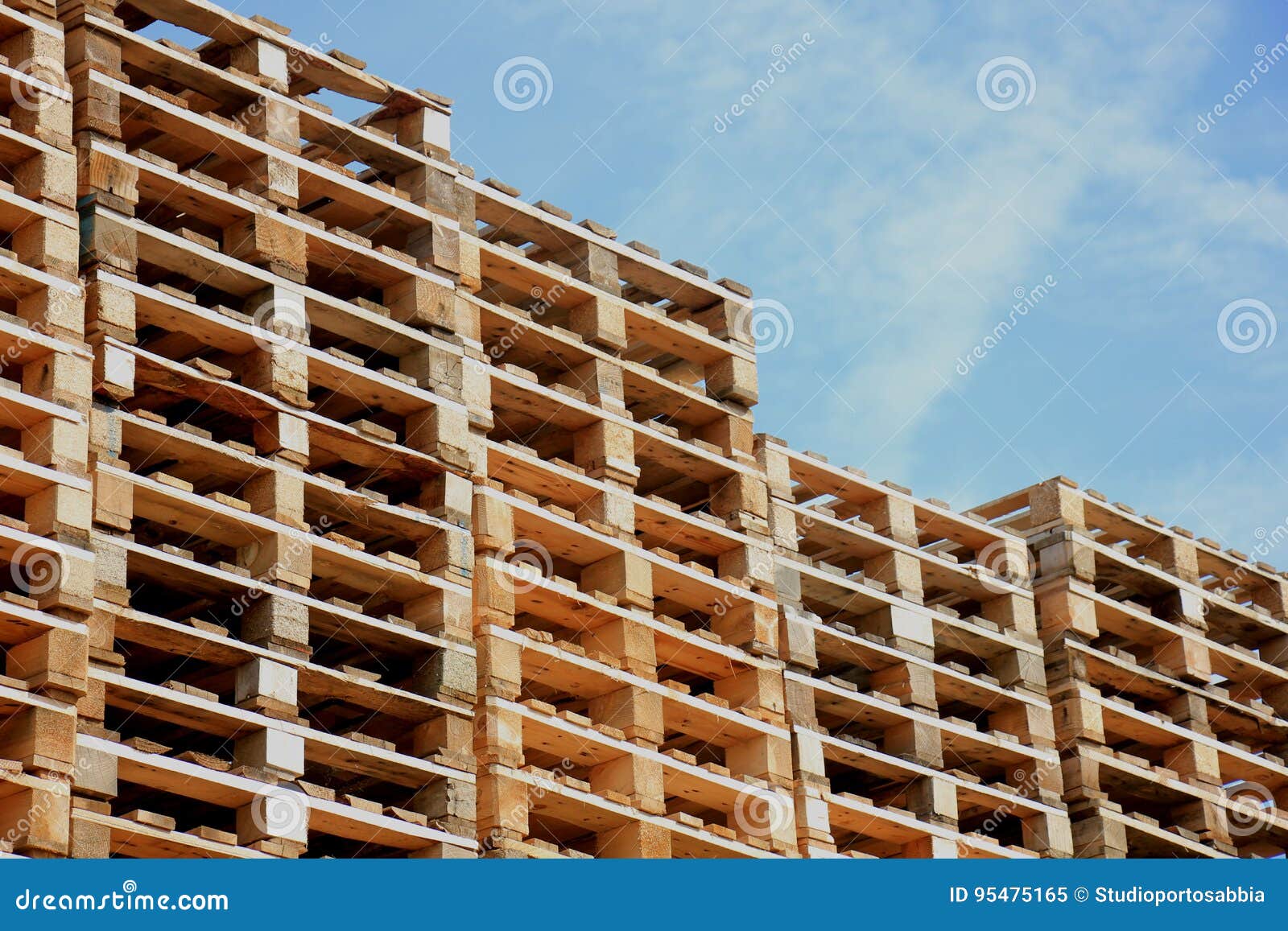 Stacked wooden pallets stock image. Image of brick, warehouse - 95475165