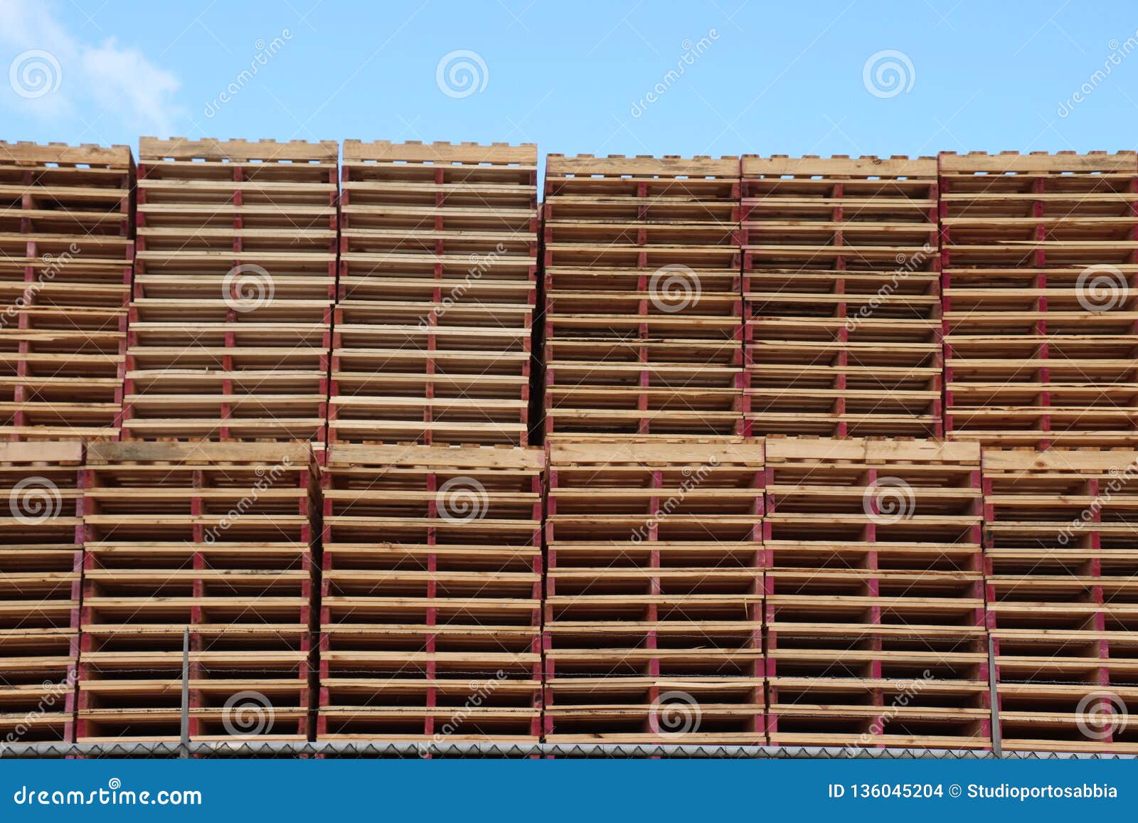 Stacked wooden pallets stock photo. Image of business - 136045204