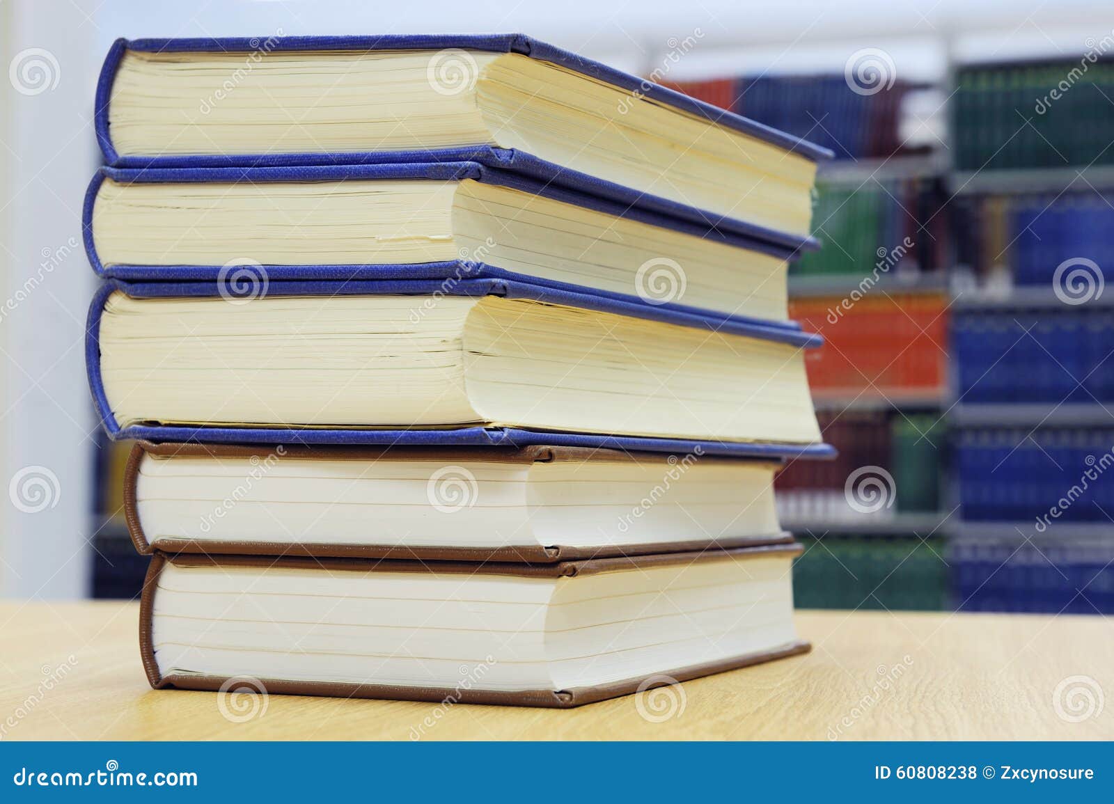 Stacking Books on Library Table Stock Photo - Image of literature ...
