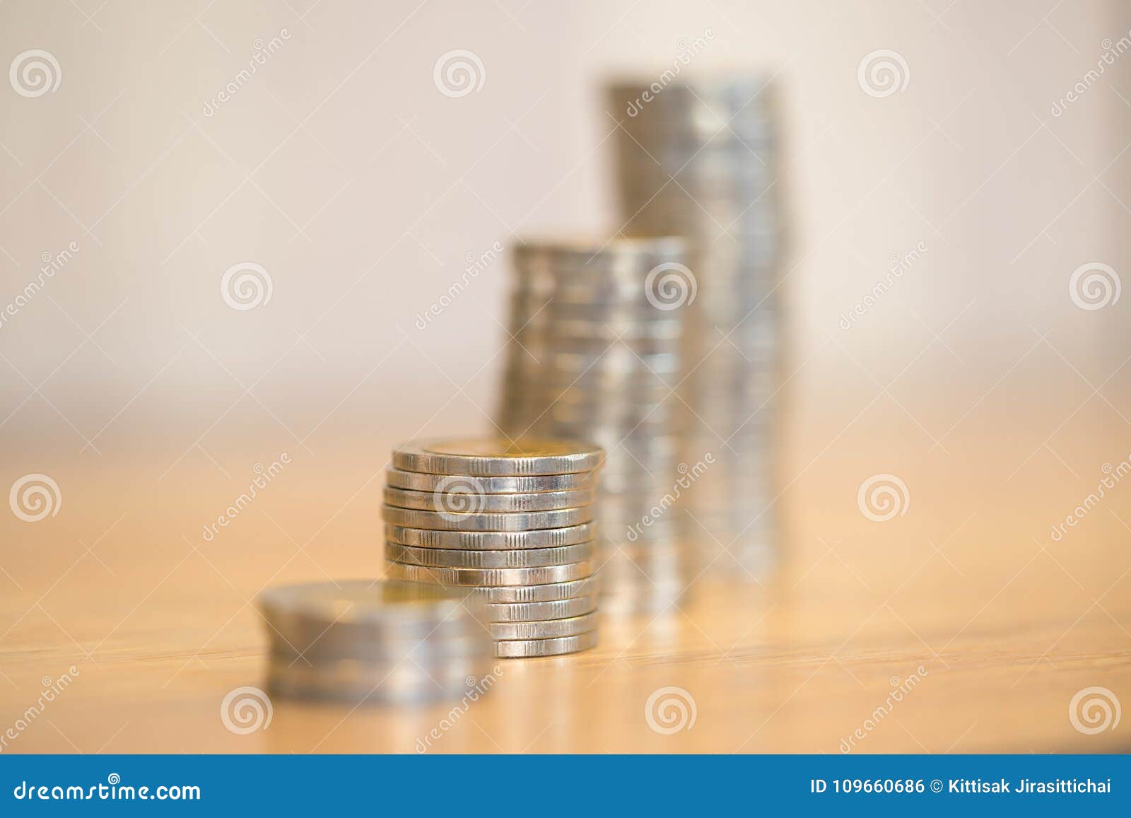 Stacking Money for Growing Chart of Coins on Wooden Desk. Stock Photo ...