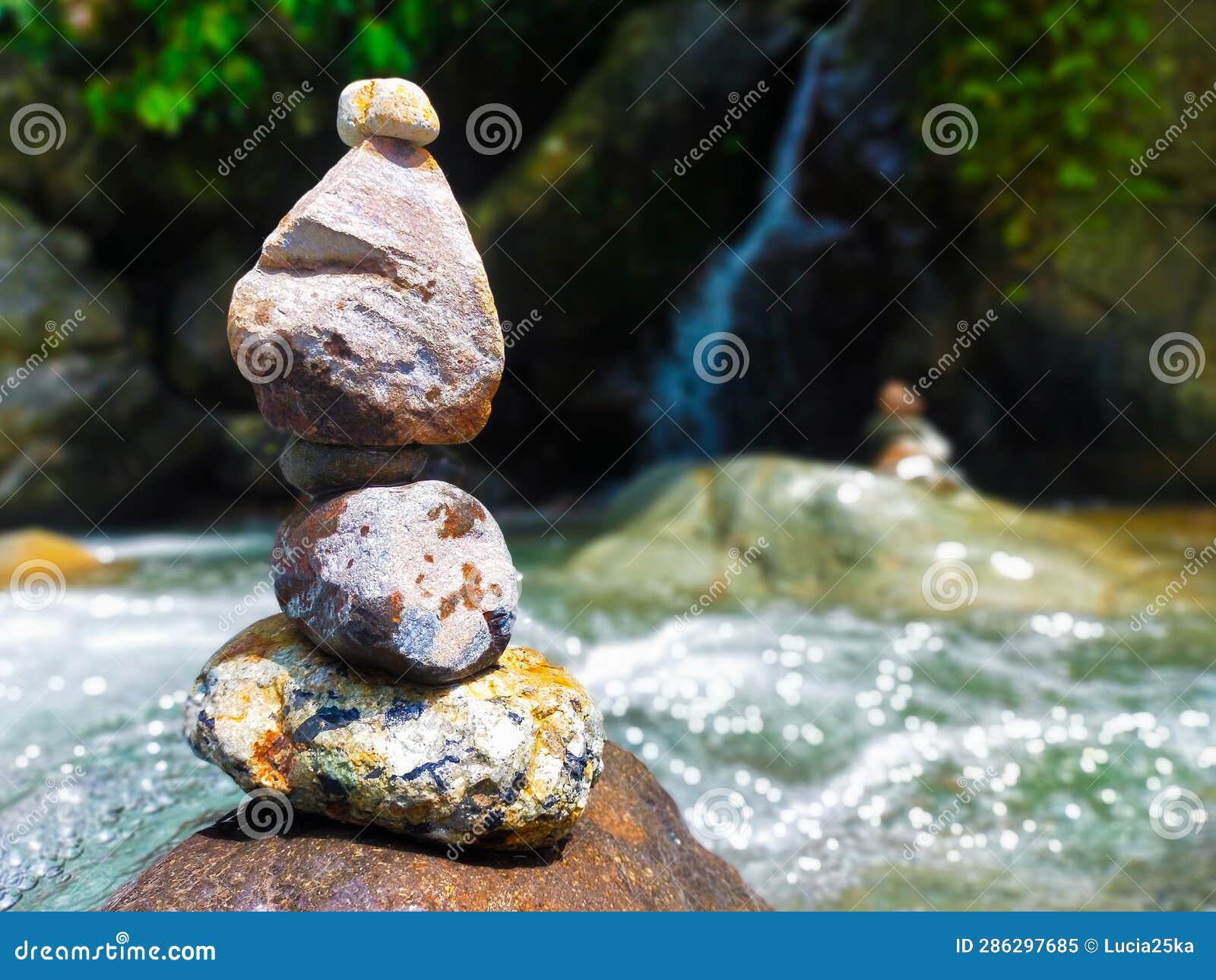 Stacking Stones on the River by the Fountain Waterfall Summer Stock ...