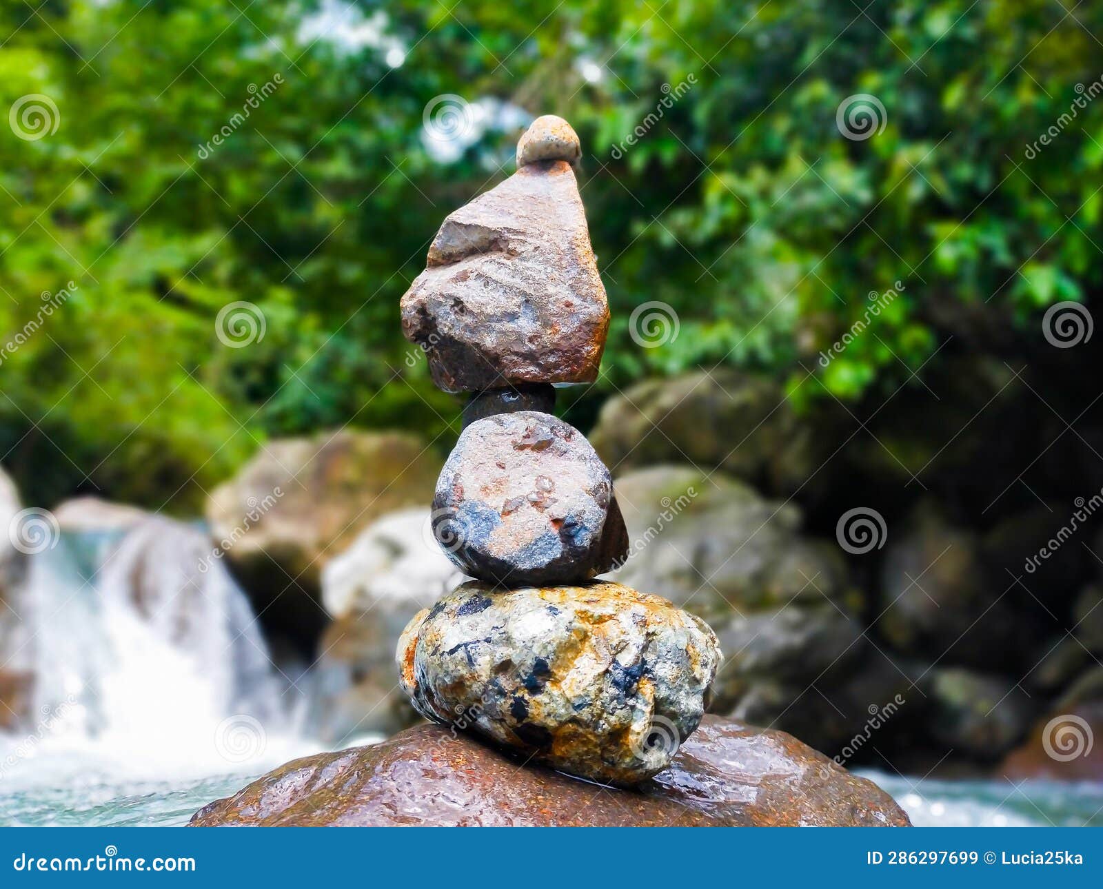 Stacking Stones on the River by the Fountain Waterfall Summer Stock ...