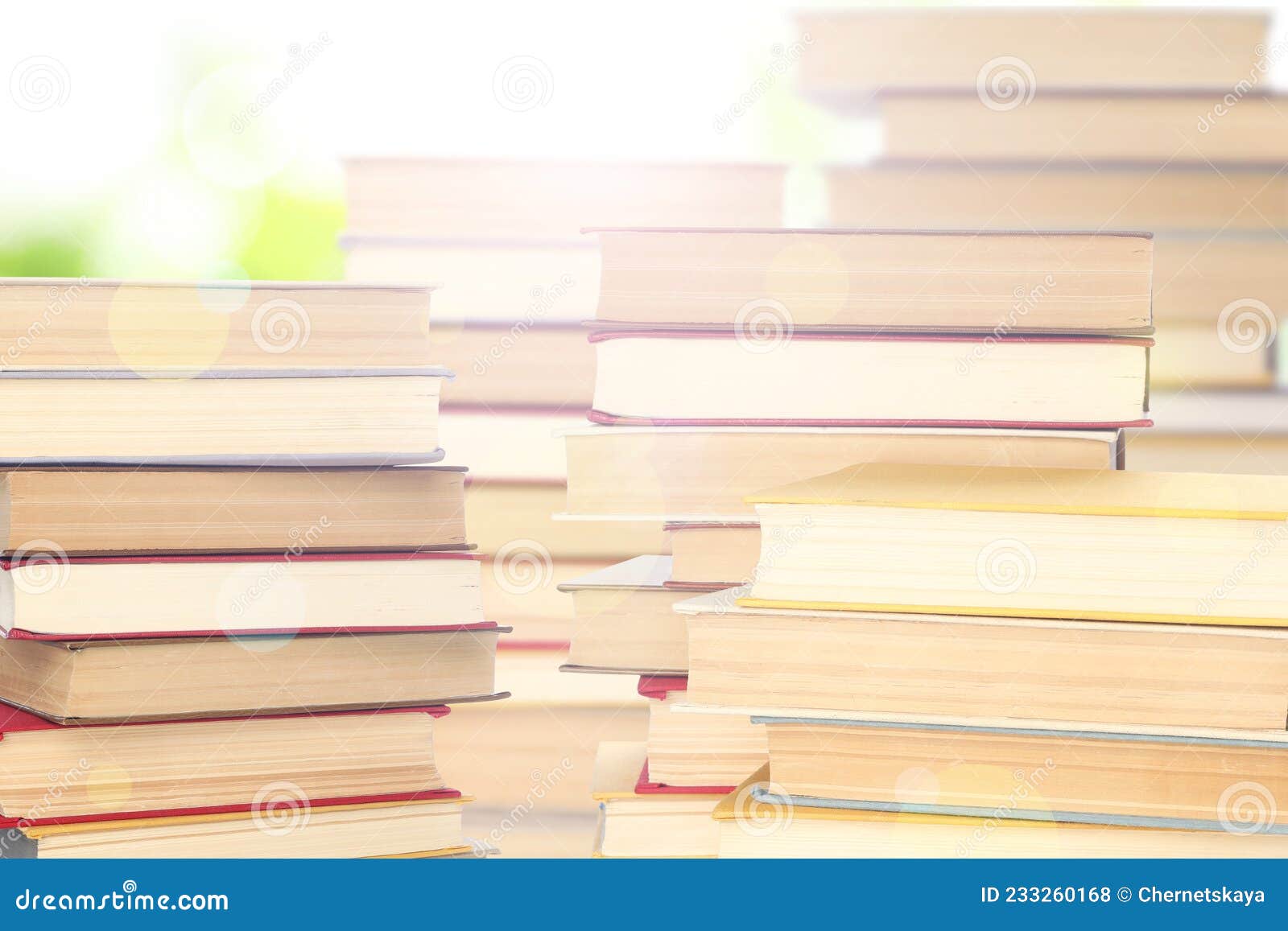 Stacks of Books on Blurred Background. Bokeh Effect Stock Photo - Image ...