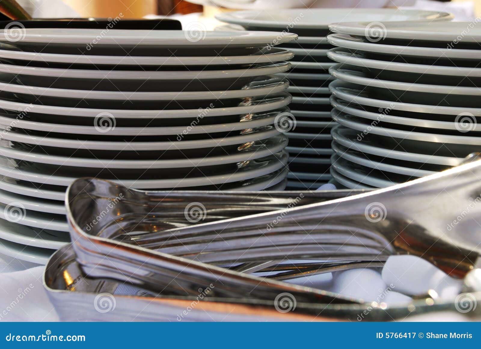 Stacks of Catering Plates with Tongs Stock Image - Image of event ...