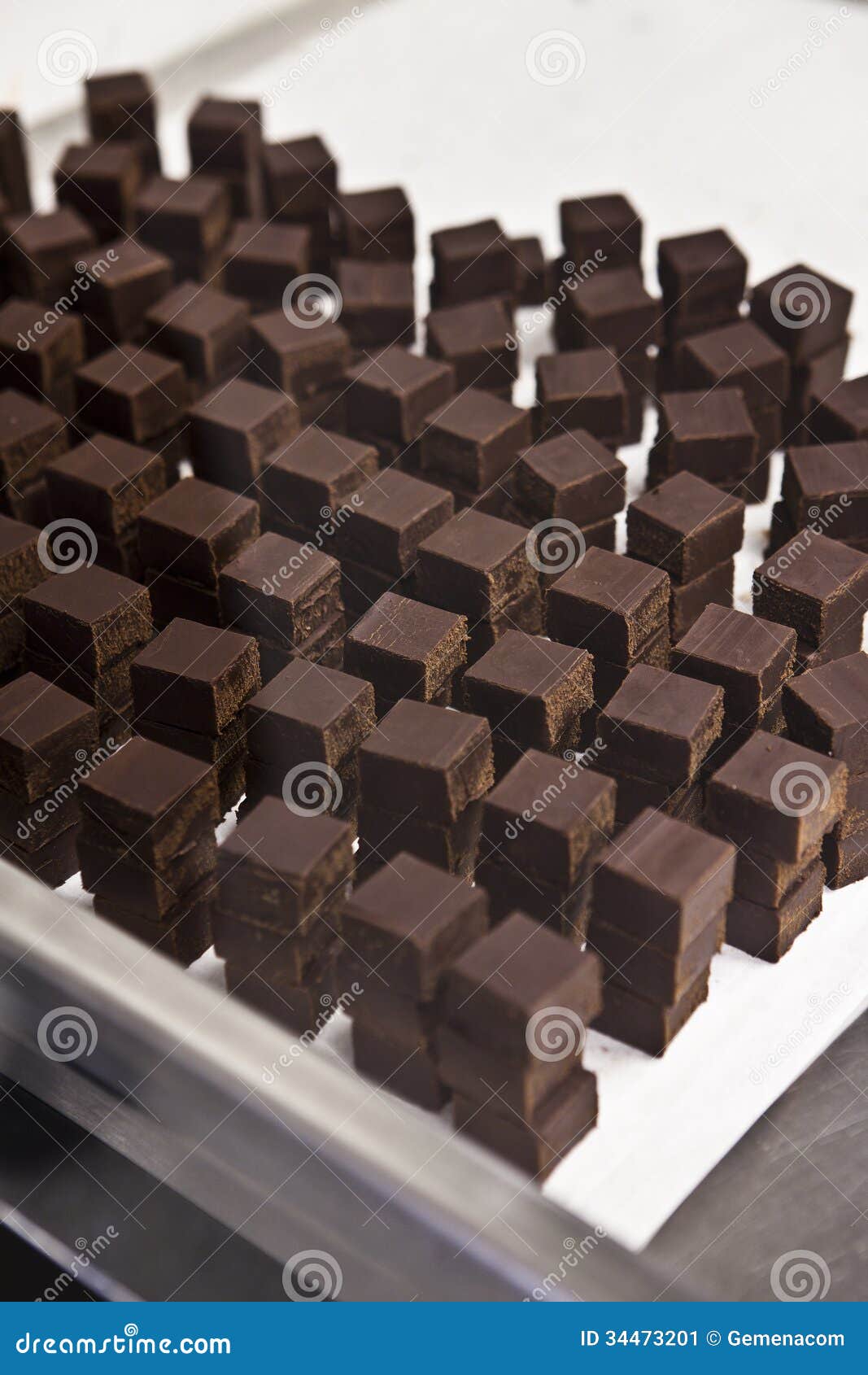 Stacks of chocolate stock image. Image of conveyor, belt - 34473201