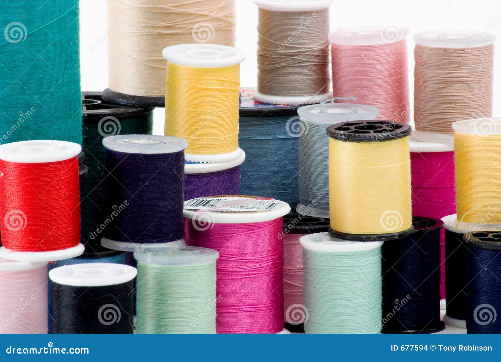 Stacks of Clothing Thread Spools Stock Photo - Image of isolated, black ...