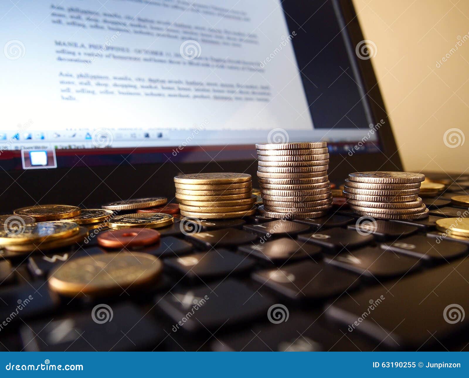 Stacks of Coins and a Laptop Computer Stock Image - Image of money ...