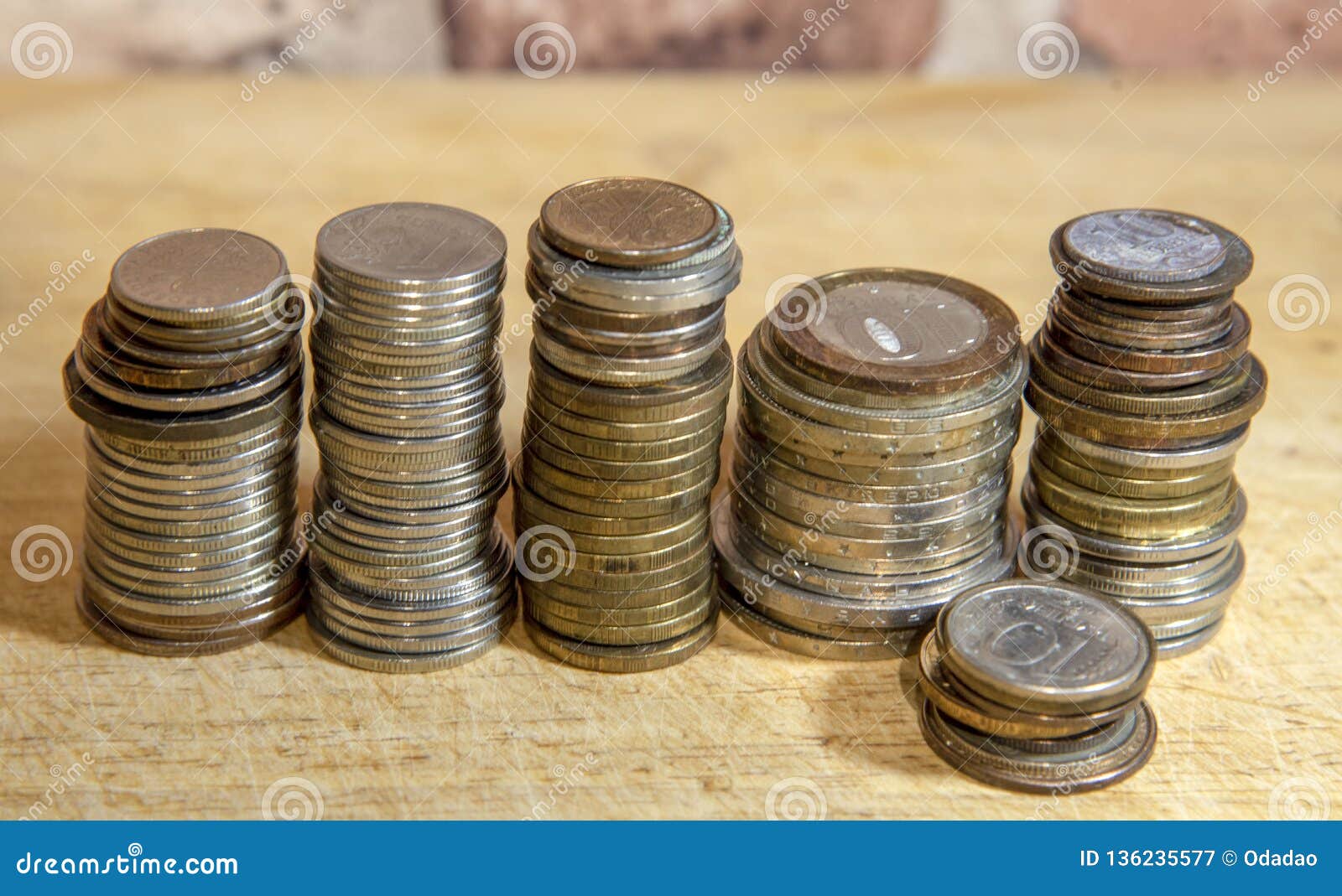 Stacks of Coins and a Vintage Brick Wall Stock Image - Image of design ...
