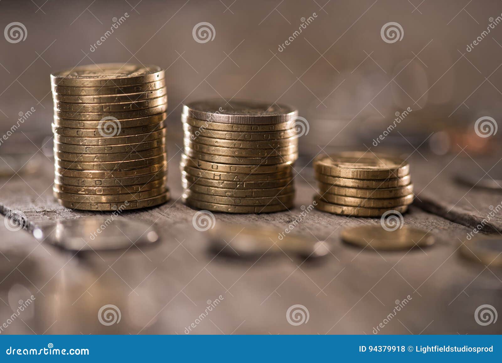 Stacks of Coins on Wooden Tabletop Stock Photo - Image of financing ...