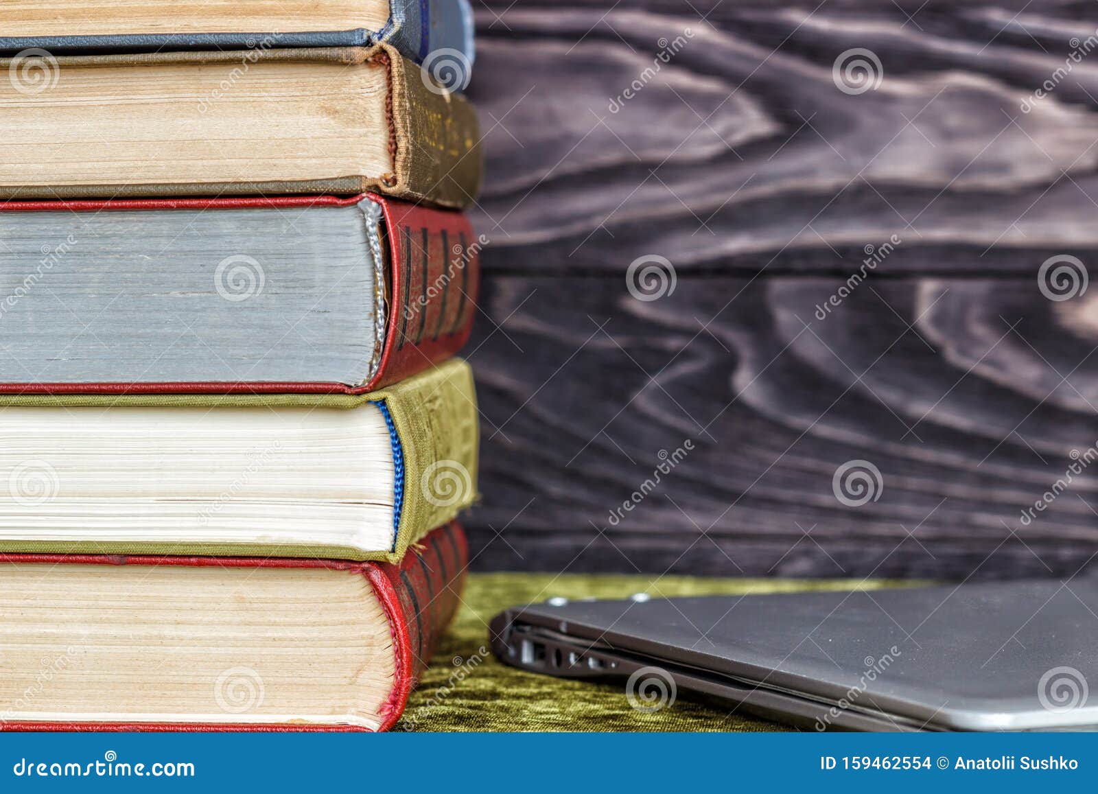 Stacks of Colored Books on a Wooden Table. Concept of Reading Habits ...